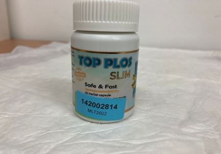 Light blue capsule of Top Plos Slim