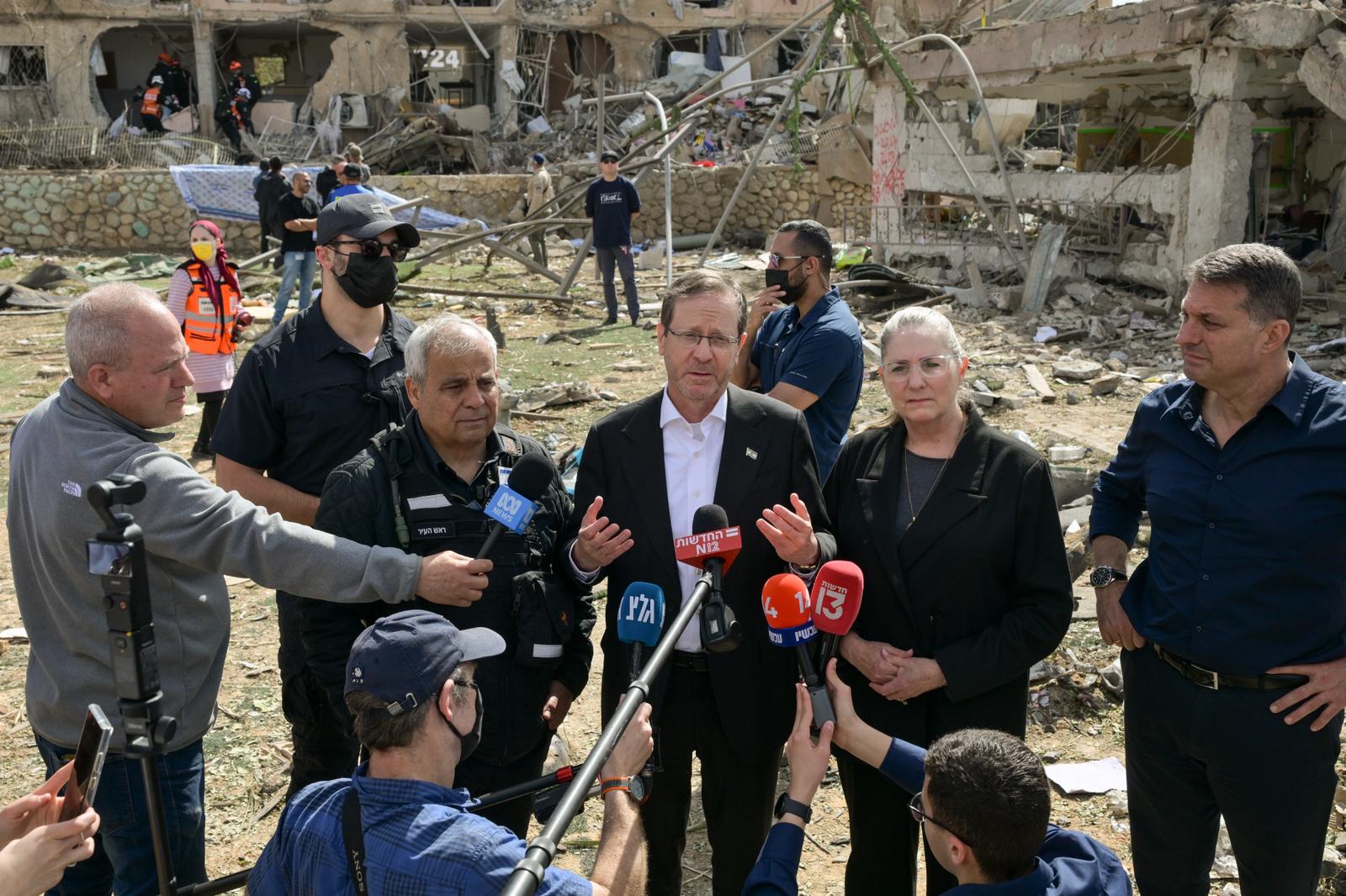 President Isaac Herzog Visits the Missile Impact Site in Dimona.