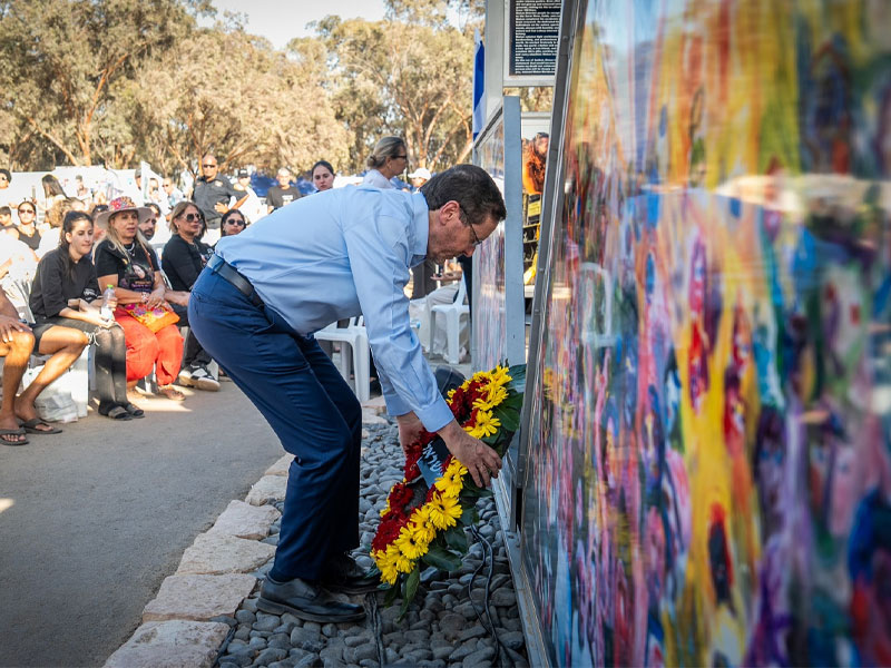 President Herzog lays a wreath at the memorial ceremony at the site of ...